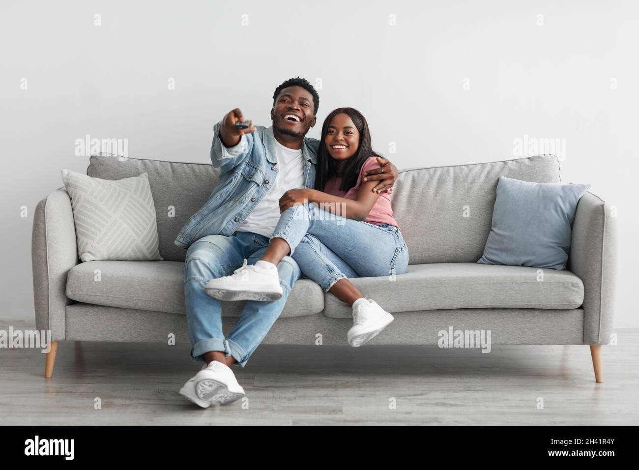 Couple Cuddling Watching A Movie