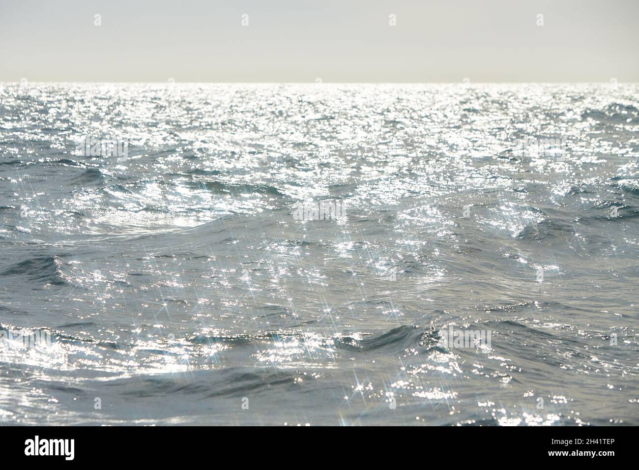 Horizon sea with waves after storm. sparkler in water - background. sea ...
