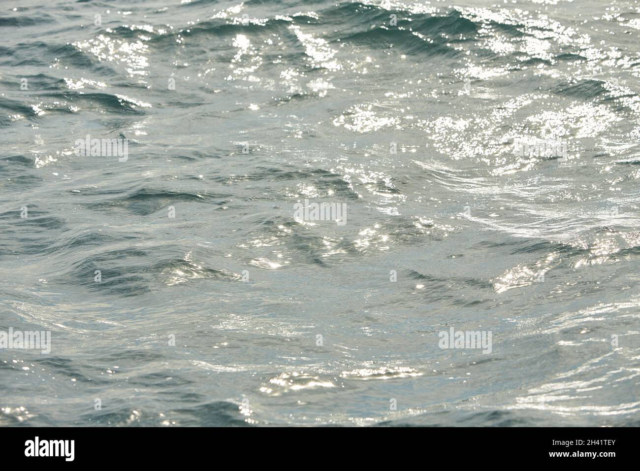 Texture of glitter water and soft waves. sparkling in water ...