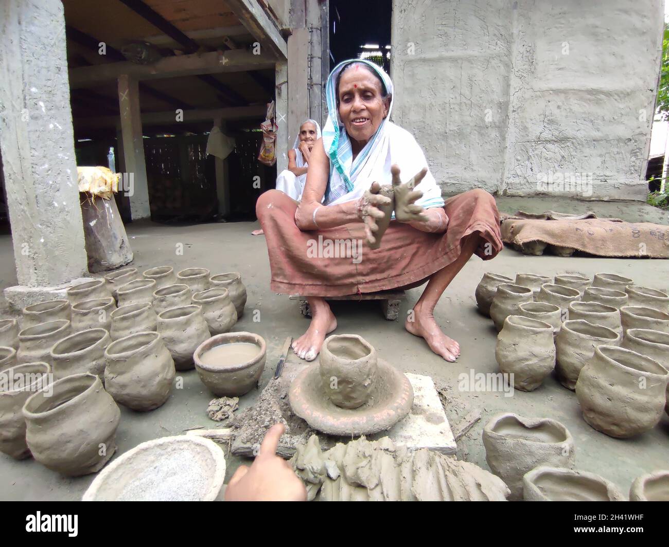Majuli pottery Making . Majuli shalmora village Stock Photo - Alamy