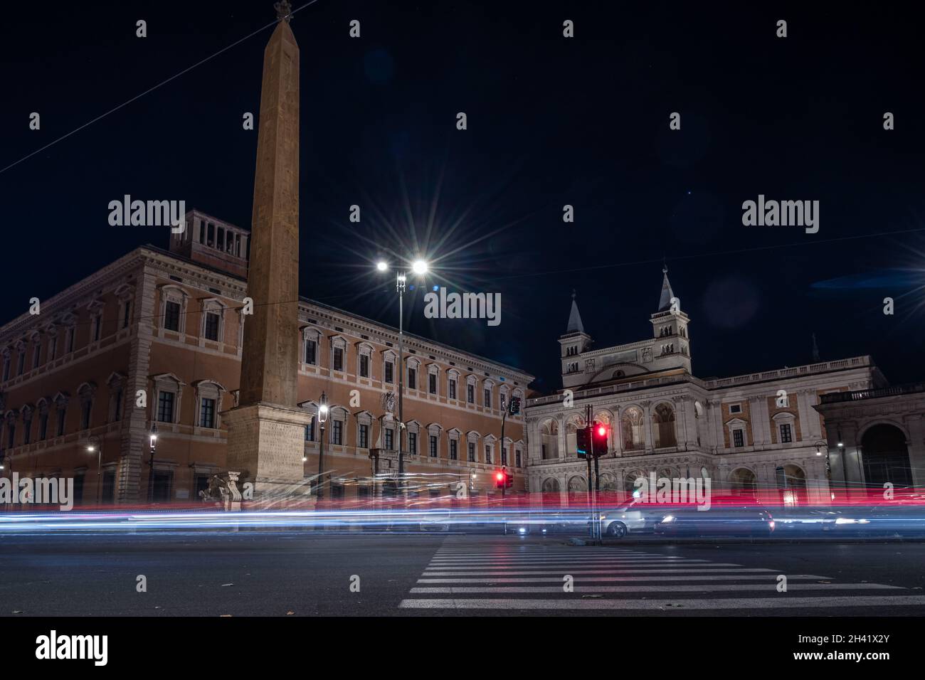 city bus station at night. saint John square at night. San Giovanni In ...