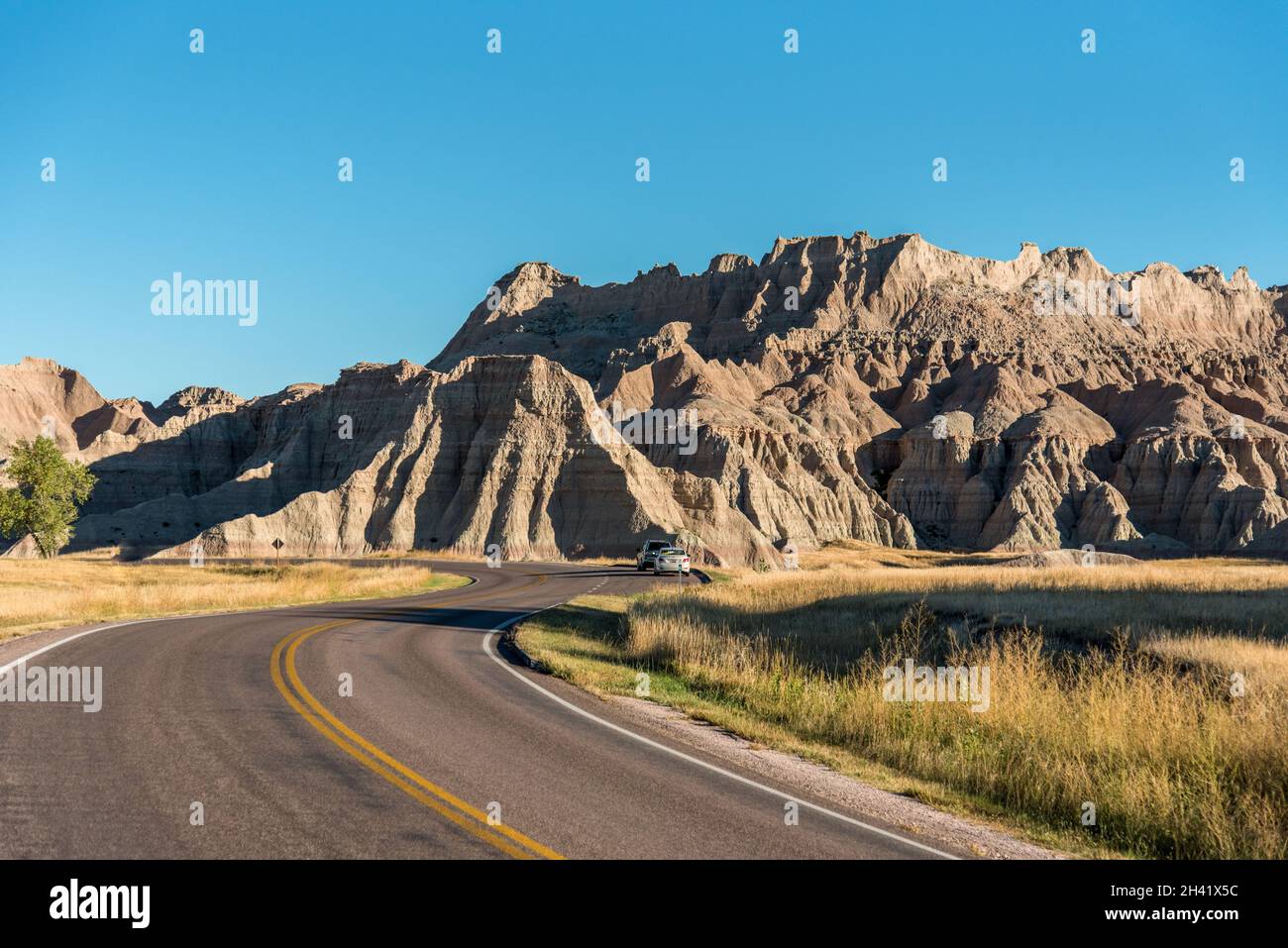 Main road leading through the Badlands National Park, USA Stock Photo ...