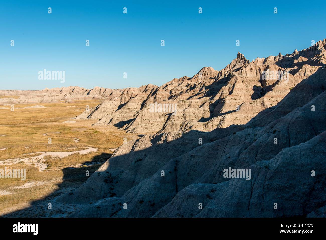 Wide landscape and sandstone hills in the Badlands National Park, USA ...