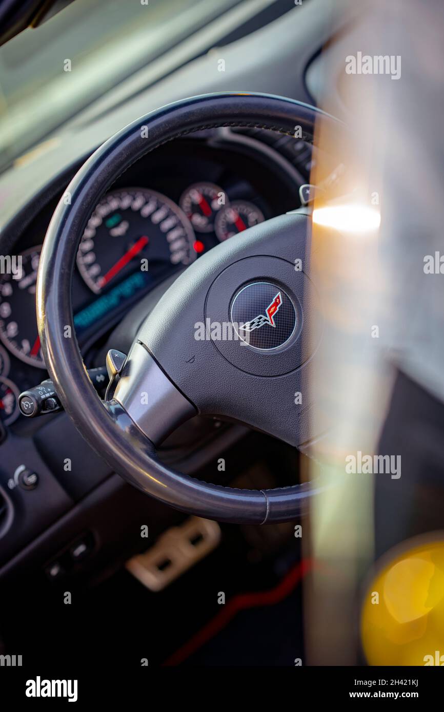 Chevrolet Corvette steering wheel batmann black Stock Photo - Alamy