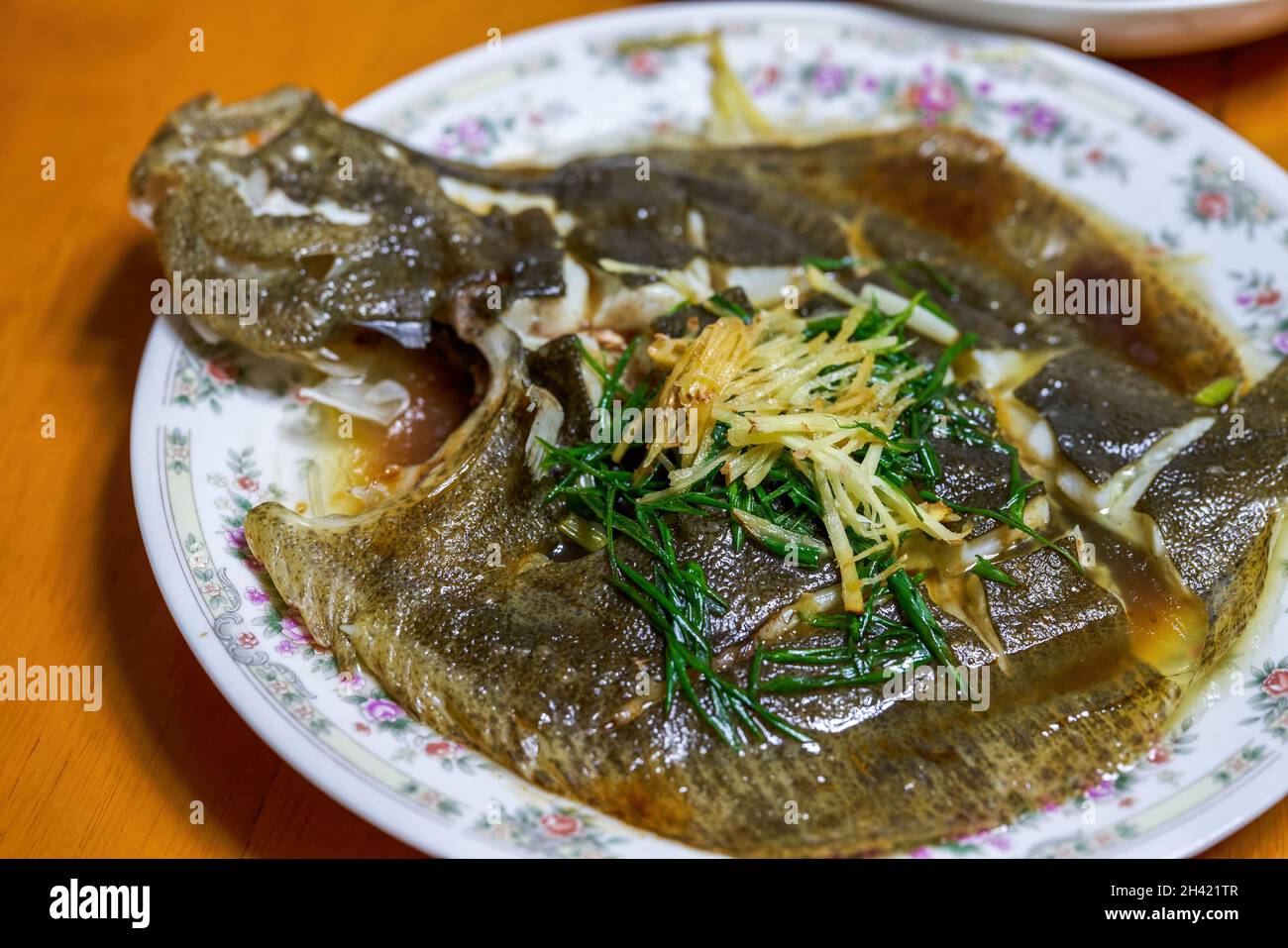 A delicious Chinese dish, steamed turbot Stock Photo - Alamy
