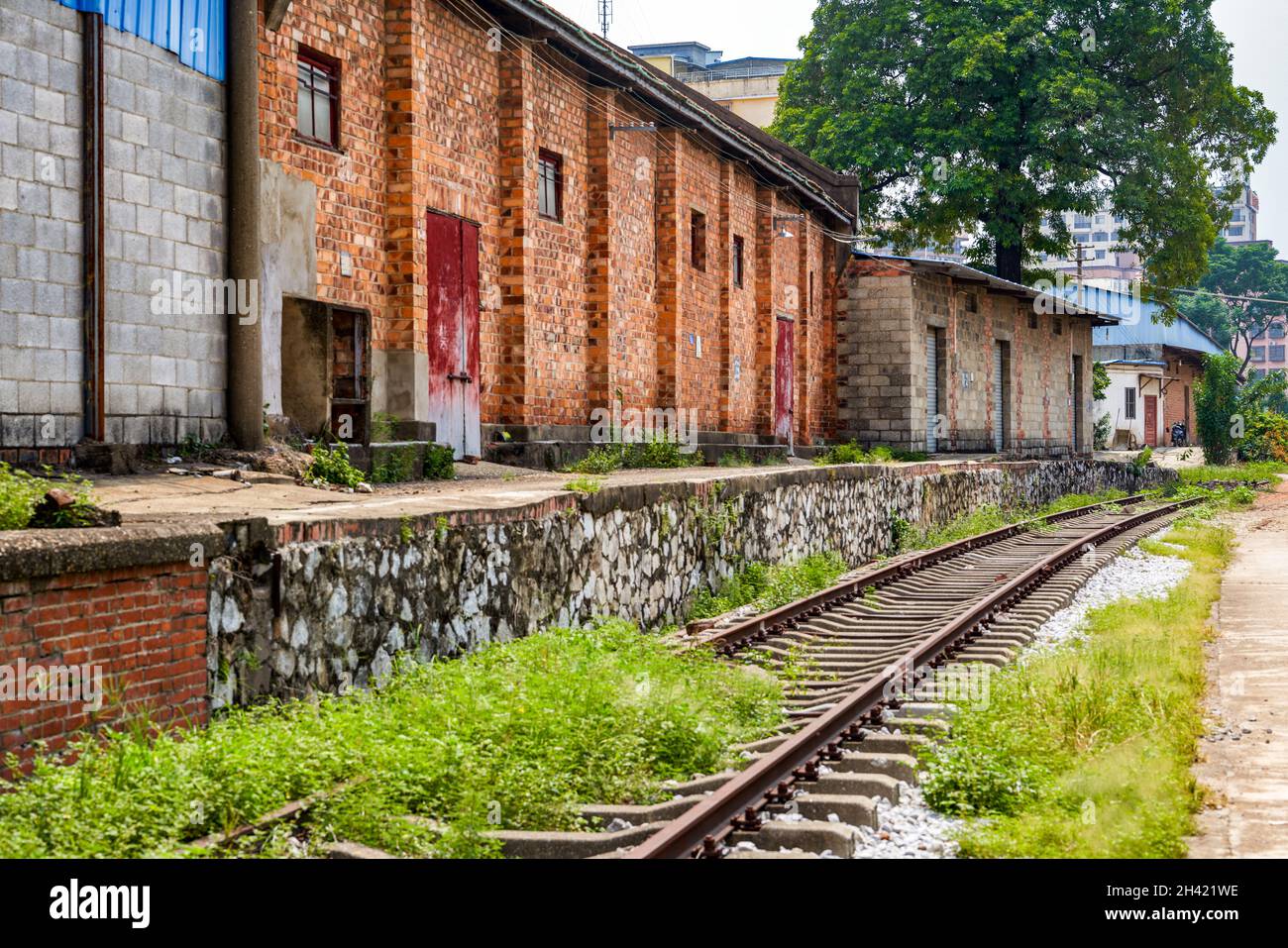 China's abandoned red brick factory buildings and freight railway ...