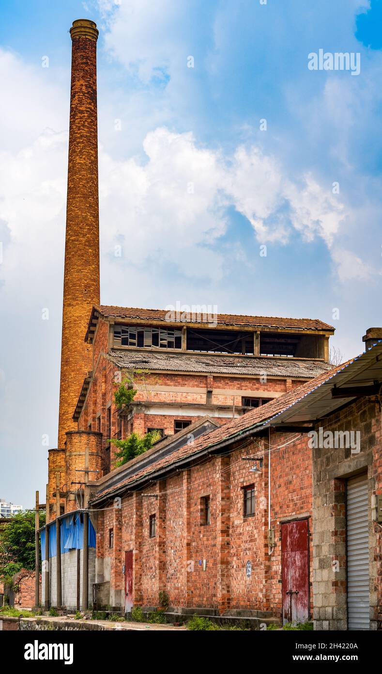 Abandoned red brick factory building and big chimney Stock Photo - Alamy