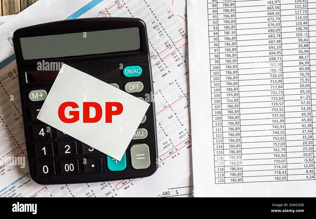 The GDP text is written on a sticker that lies on the calculator and ...