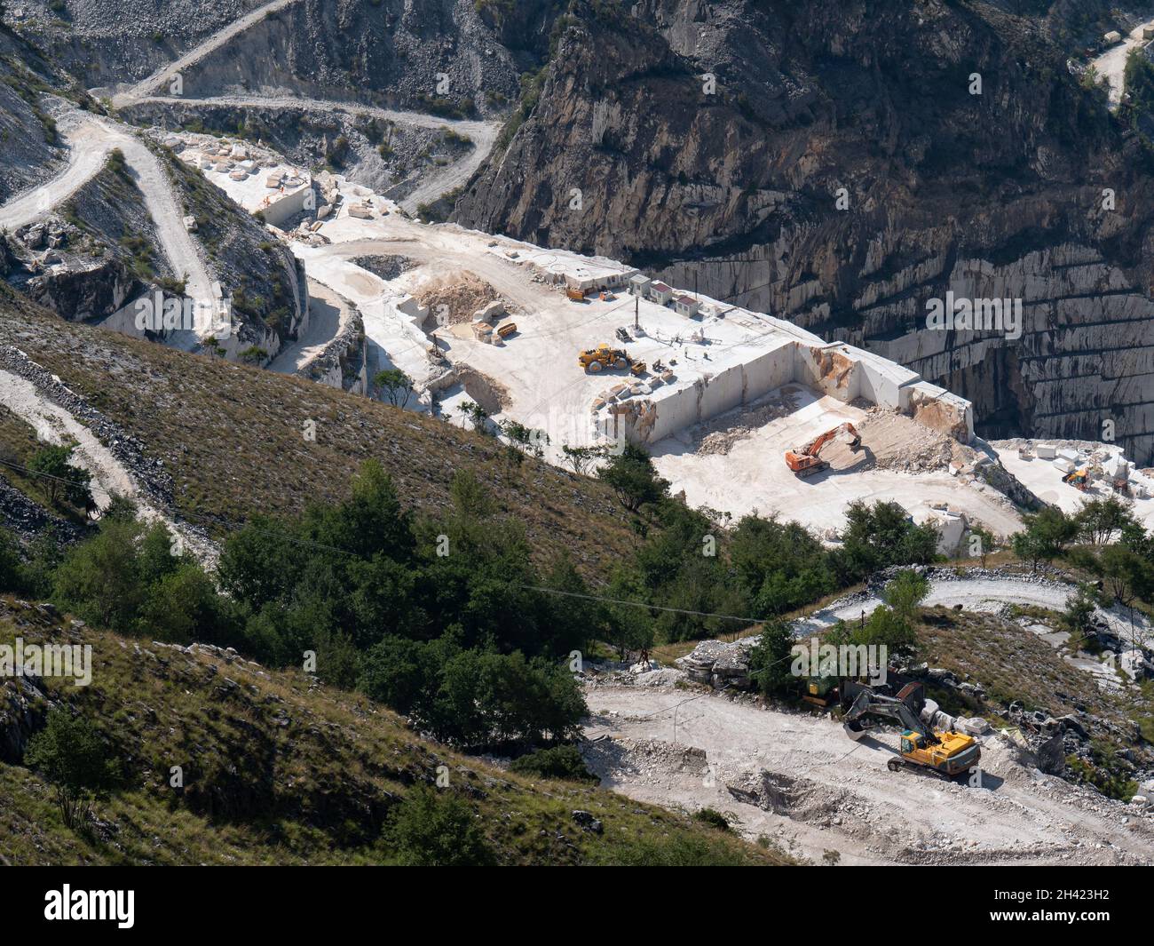 View of the Carrara Marble Quarries with Excavation Vehicles ready for ...