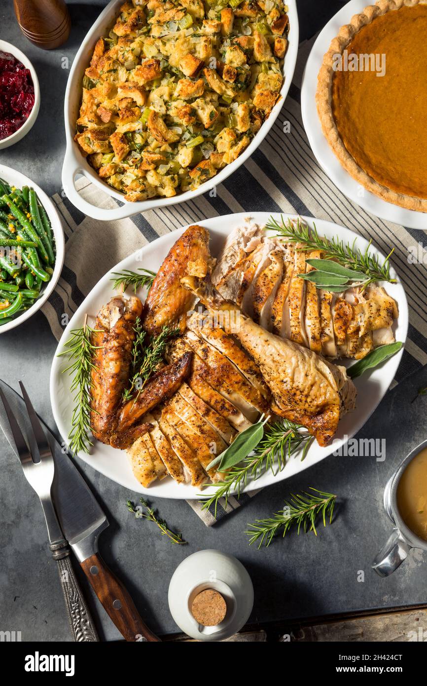 Festive Thanksgiving Day Turkey Dinner with Stuffing Pumpkin PIe and ...