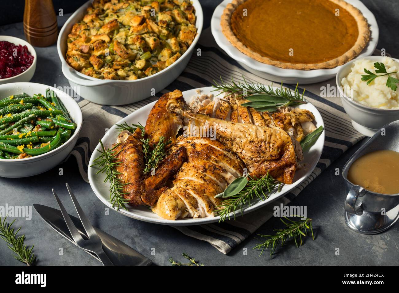 Festive Thanksgiving Day Turkey Dinner with Stuffing Pumpkin PIe and ...
