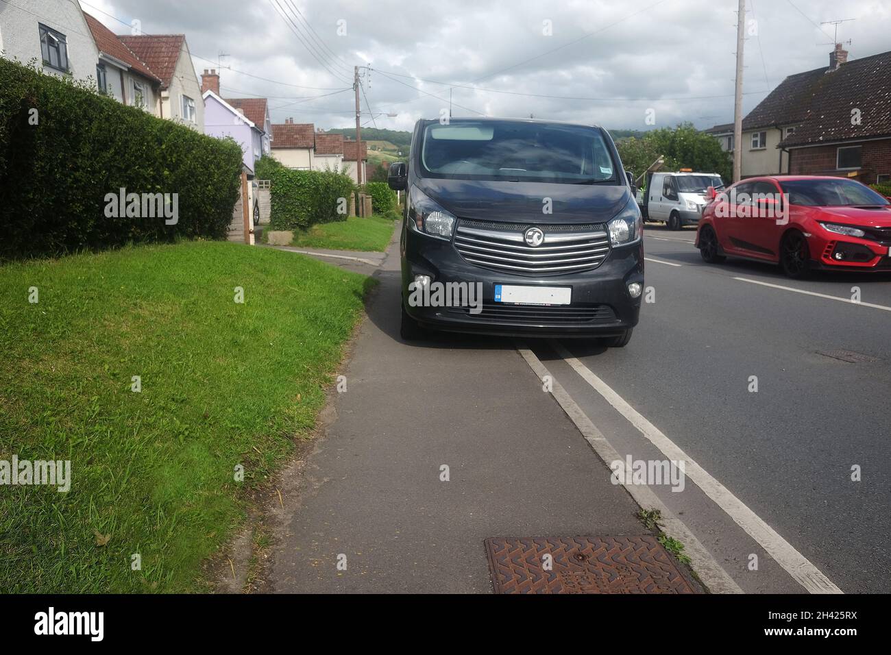 Van blocking pavement hi-res stock photography and images - Alamy