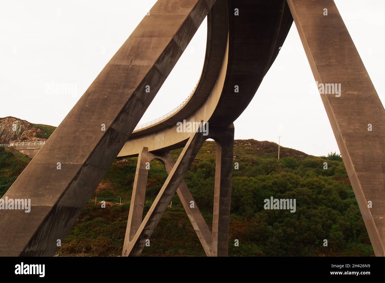 A view of the Kylesku bridge , Sutherland, Scotland, showing its curved ...