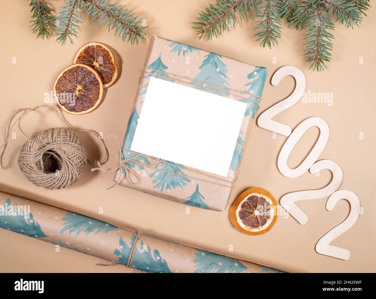 New Year DIY wrapped in festive paper gift box with empty space and ...