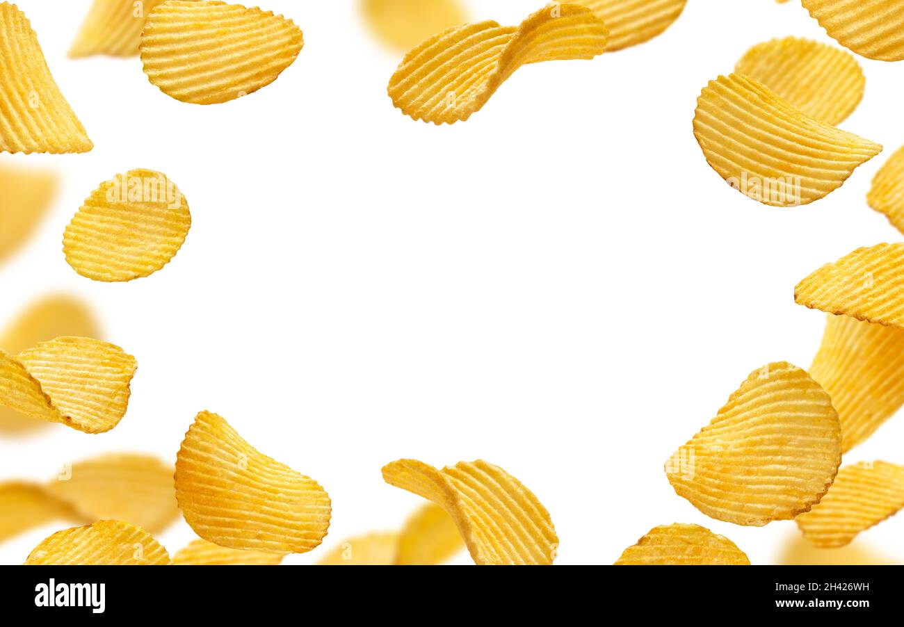 Frame of ridged potato chips isolated on white background Stock Photo ...