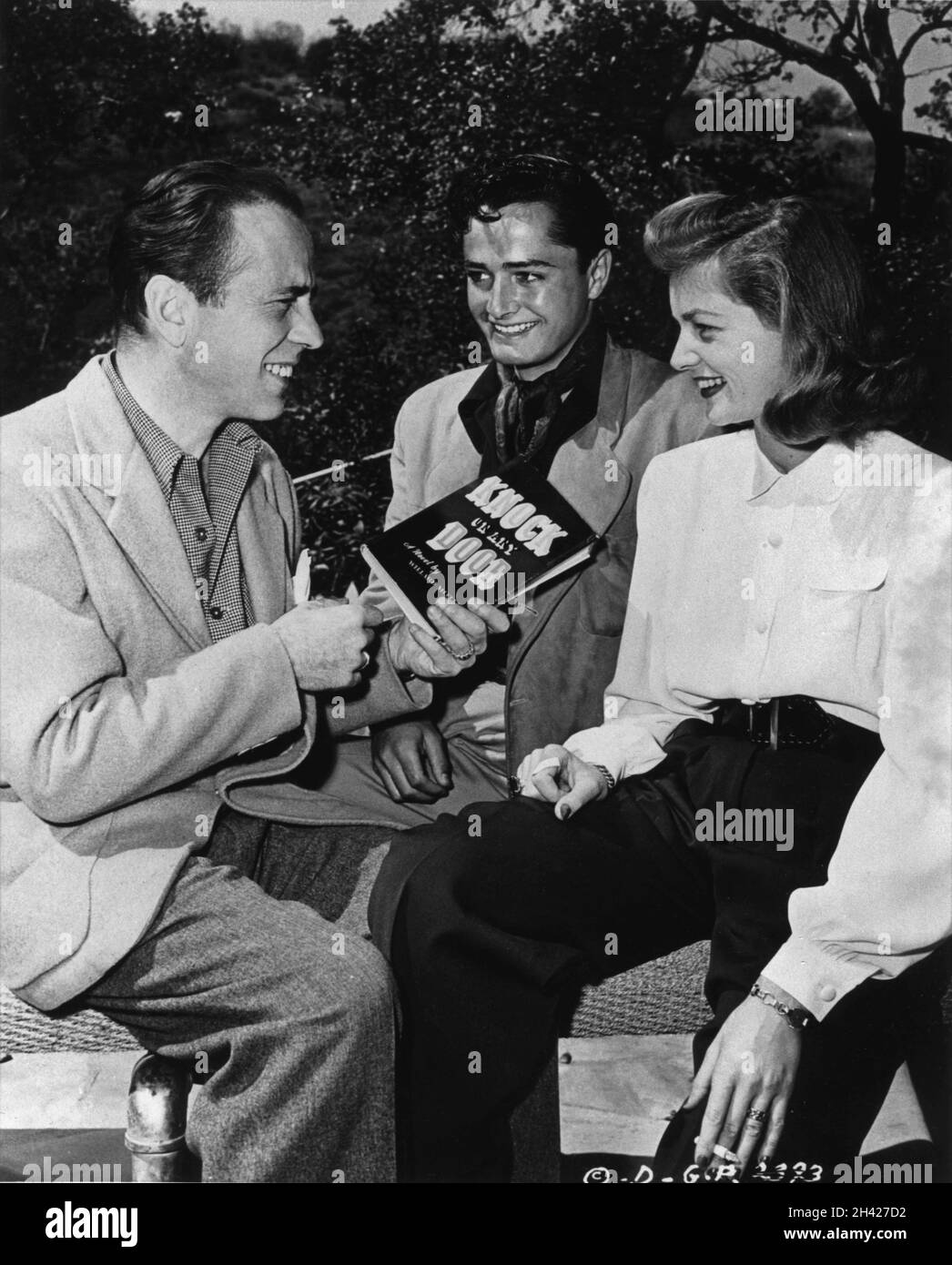 HUMPHREY BOGART and his Wife LAUREN BACALL with JOHN DEREK publicity ...