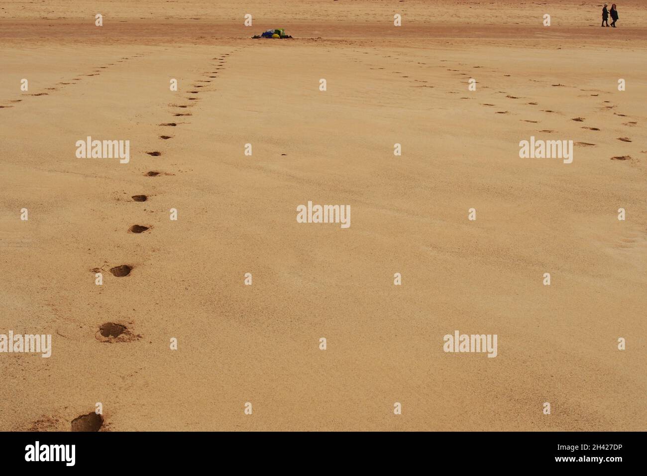 Clothes beach footprints hi-res stock photography and images - Alamy