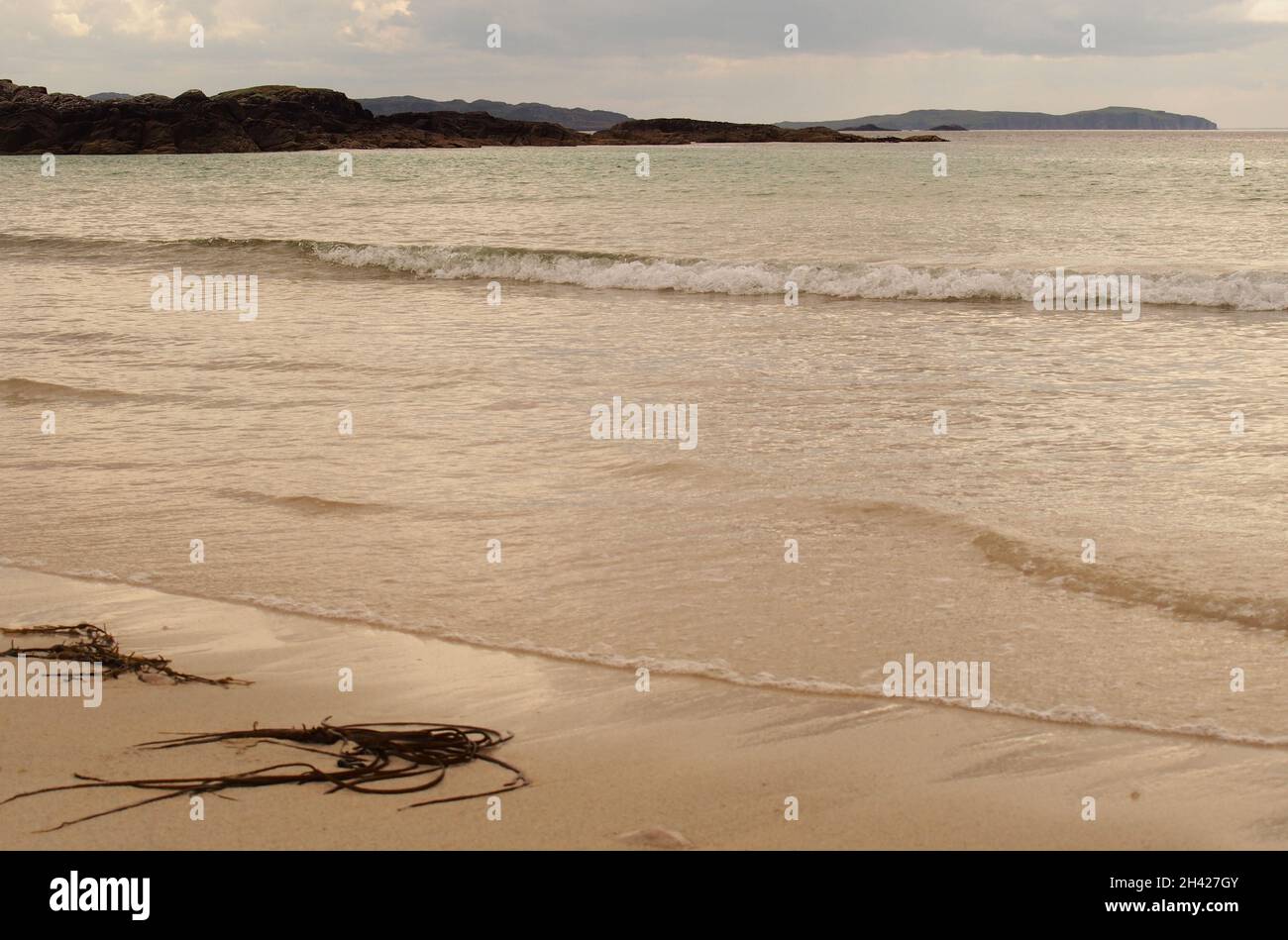 Looking out to sea from Polin Bay, beach, Sutherland, Scotland, with ...
