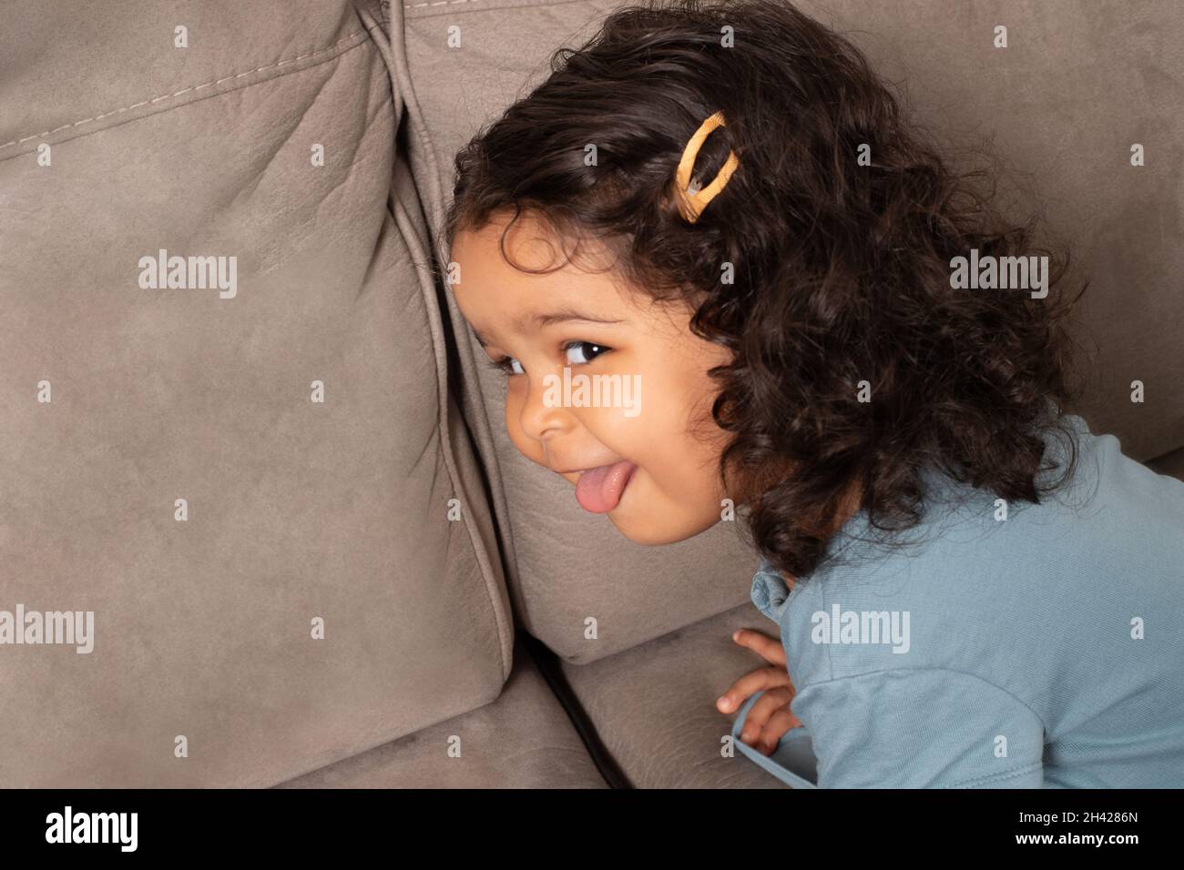 Mischievous baby hi-res stock photography and images - Alamy