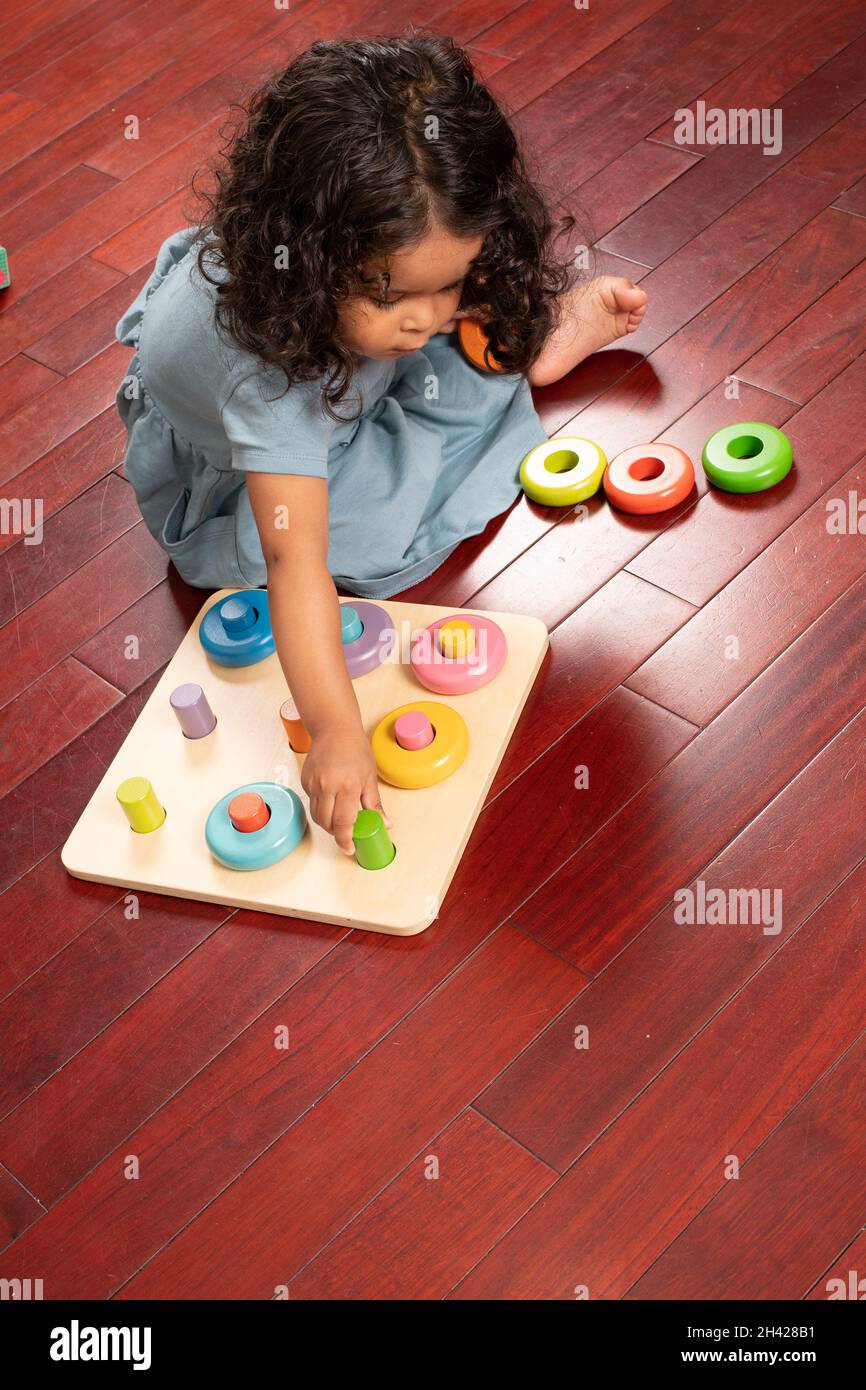 Baby fine motor skills hi-res stock photography and images - Alamy