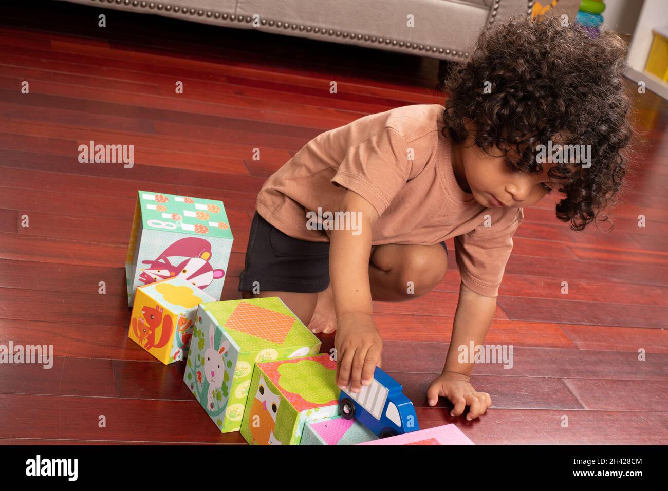 Baby playing blocks hi-res stock photography and images - Alamy