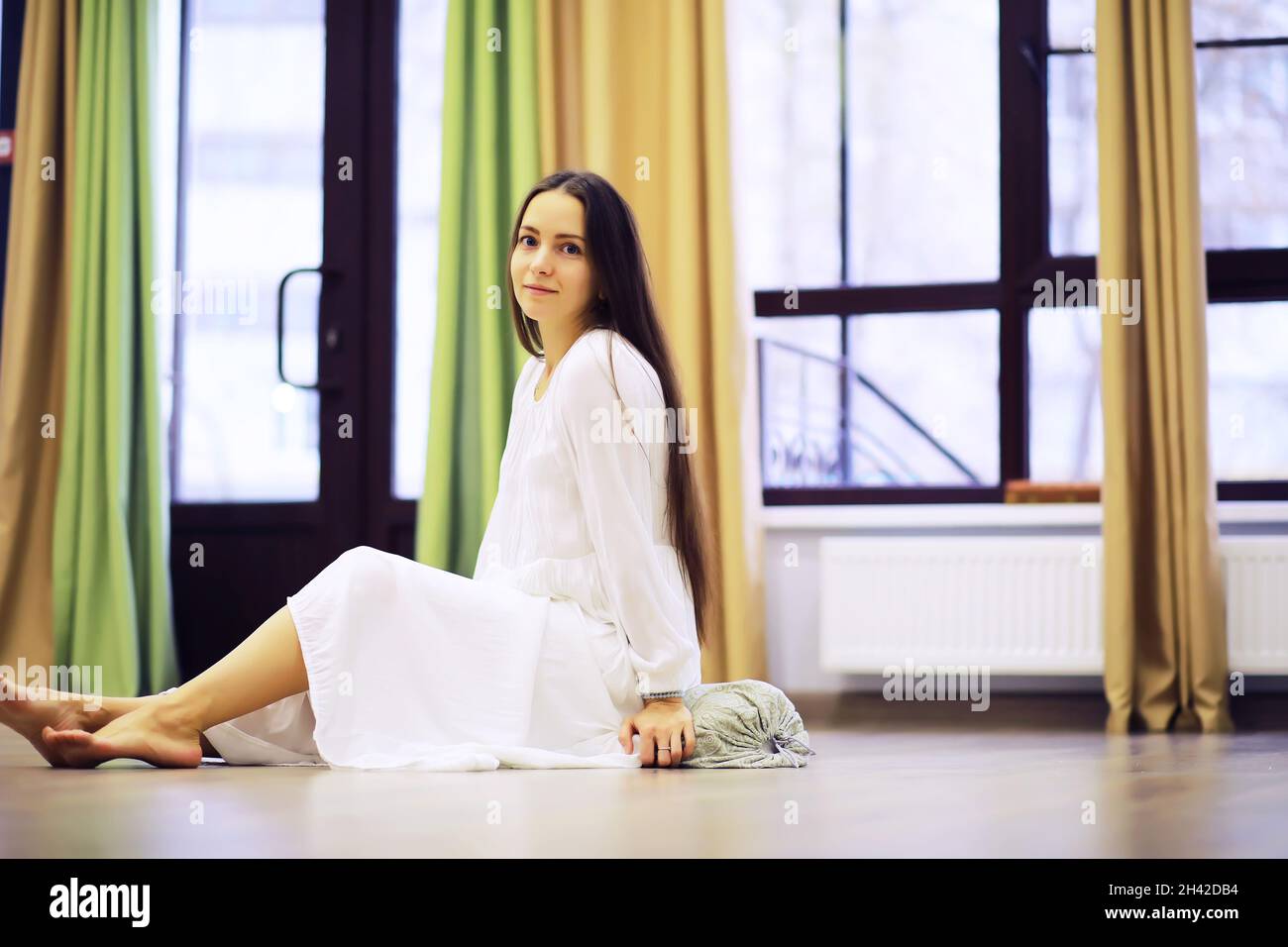 Relaxed serene pretty young woman at home, happy calm lady dream enjoy ...