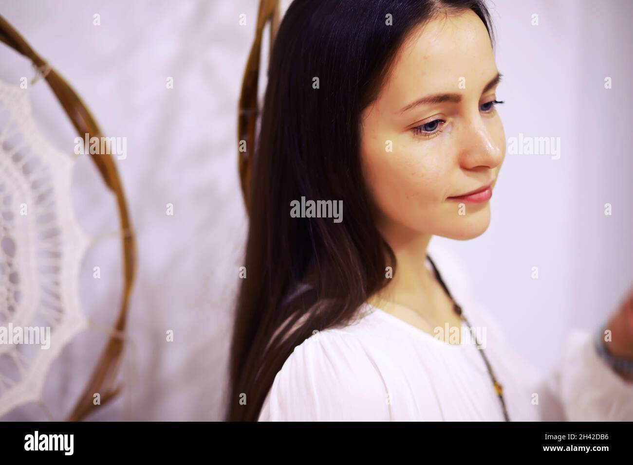 Relaxed serene pretty young woman at home, happy calm lady dream enjoy ...