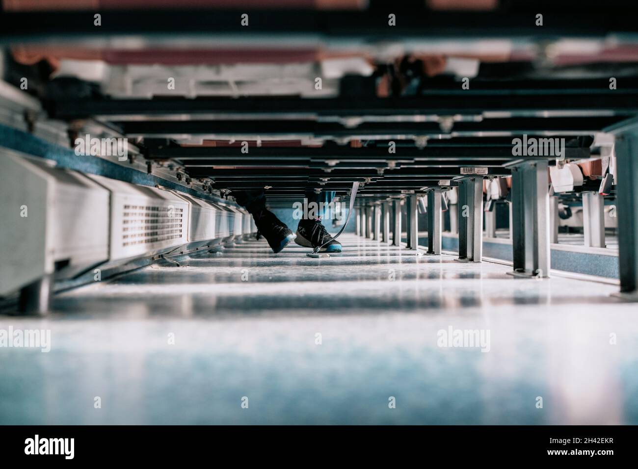 The feet of the person sitting on the gatch bed in the hospital Stock ...