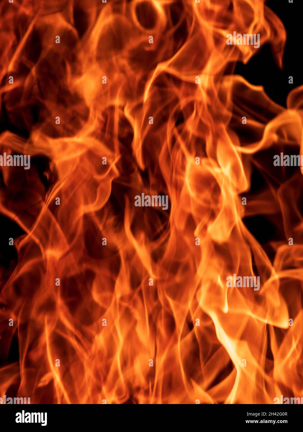 Abstract flame, fire flame texture, background. Blurred moving tongues ...