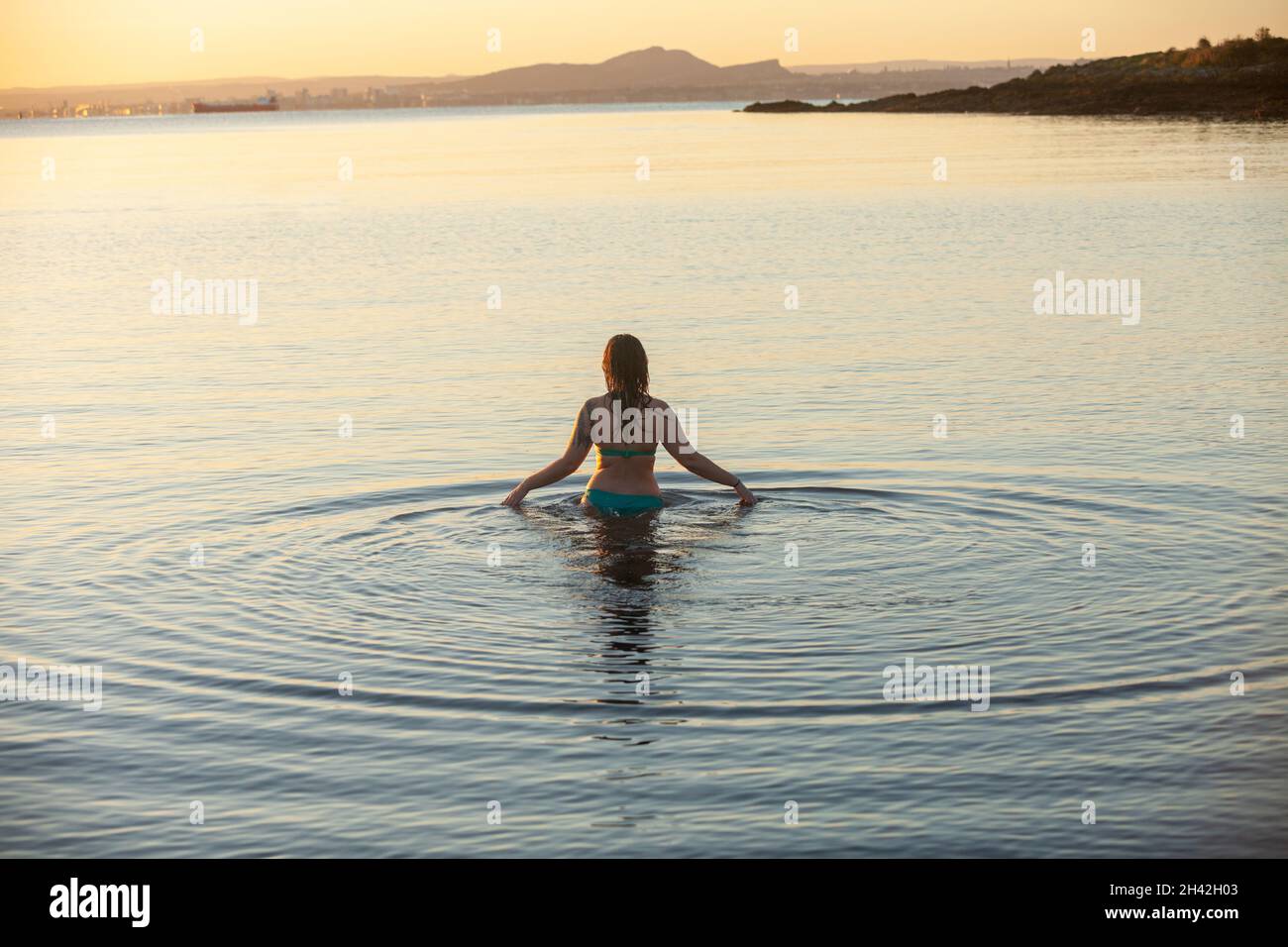 Swimmer entering the sea hi-res stock photography and images - Alamy