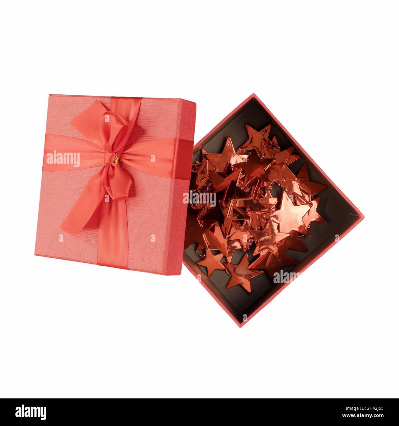 Red gift box with red stars on a white isolated background. View from ...