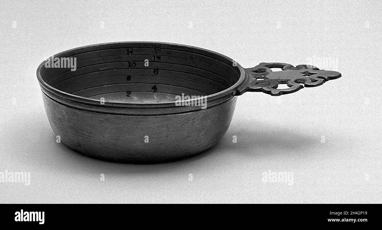 Pewter bleeding bowl, with pierced handle, 17th to 18th century Stock ...