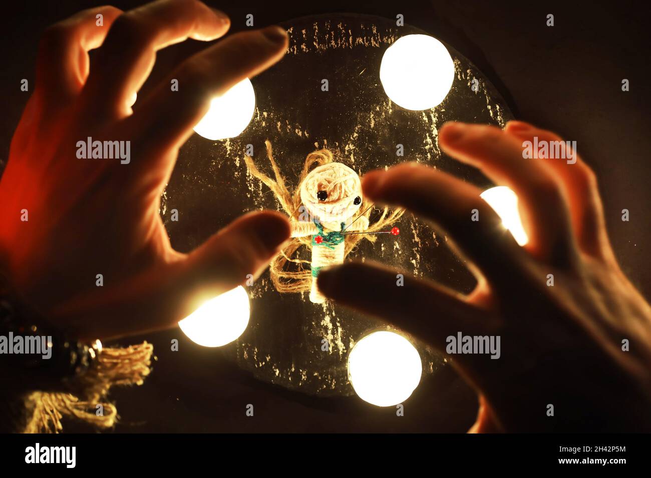 Mystic still life with voodoo doll, the tarot cards, books, evil ...