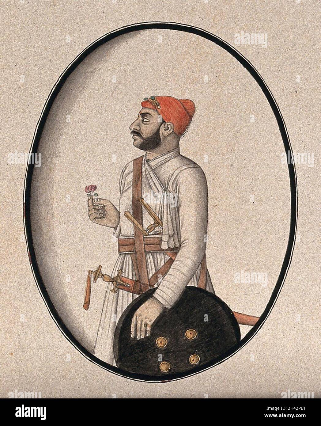A Mughal courtier wearing a red turban and carrying a sword, dagger and ...