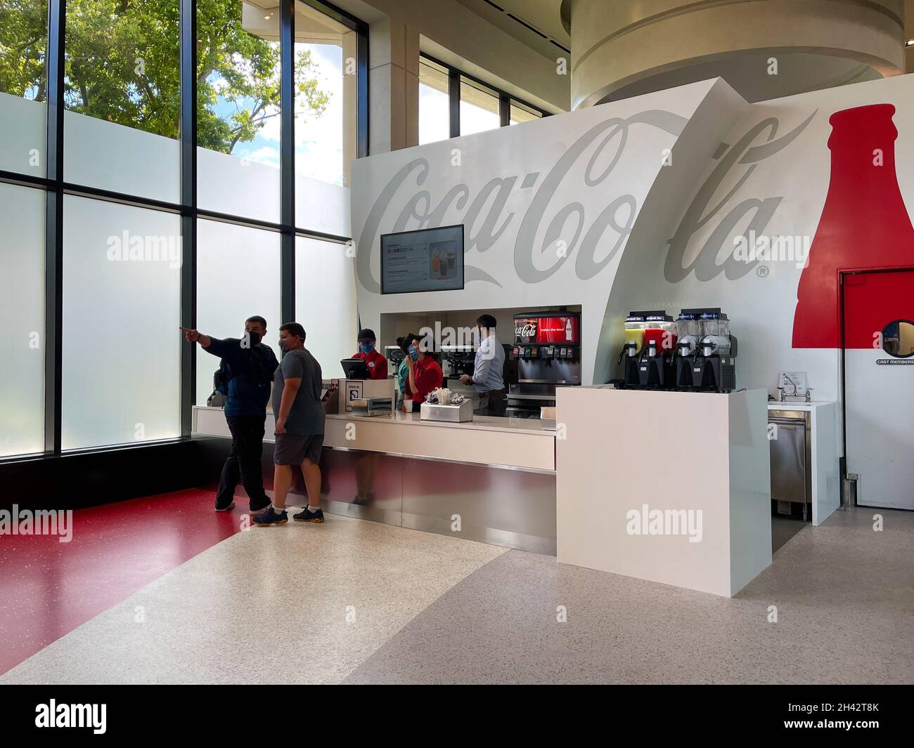 Orlando, FL USA - October 9, 2021: People purchasing soda from an ...
