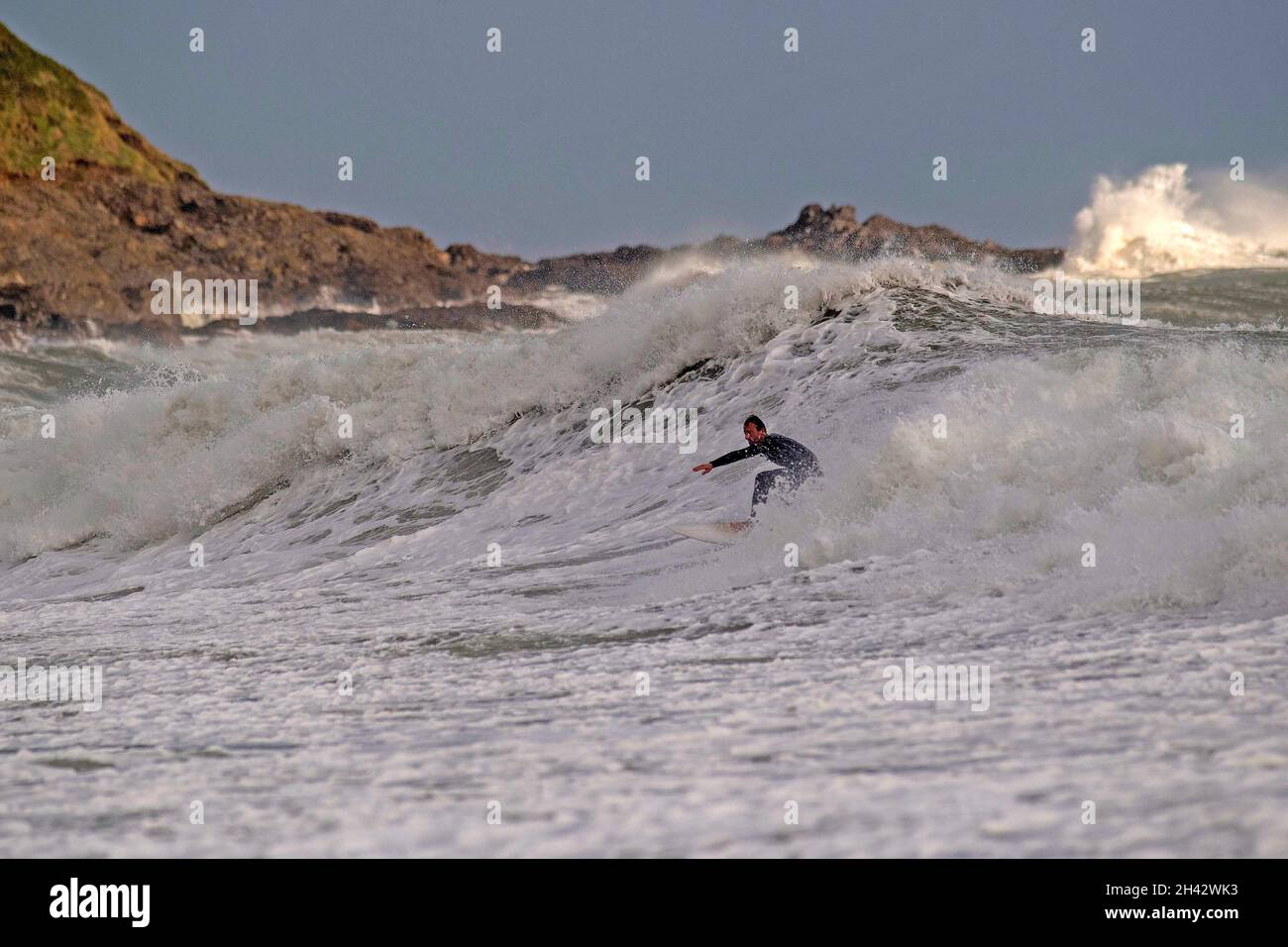 Swansea, UK. 31st Oct, 2021. Surfers enjoying the waves at Langland Bay ...