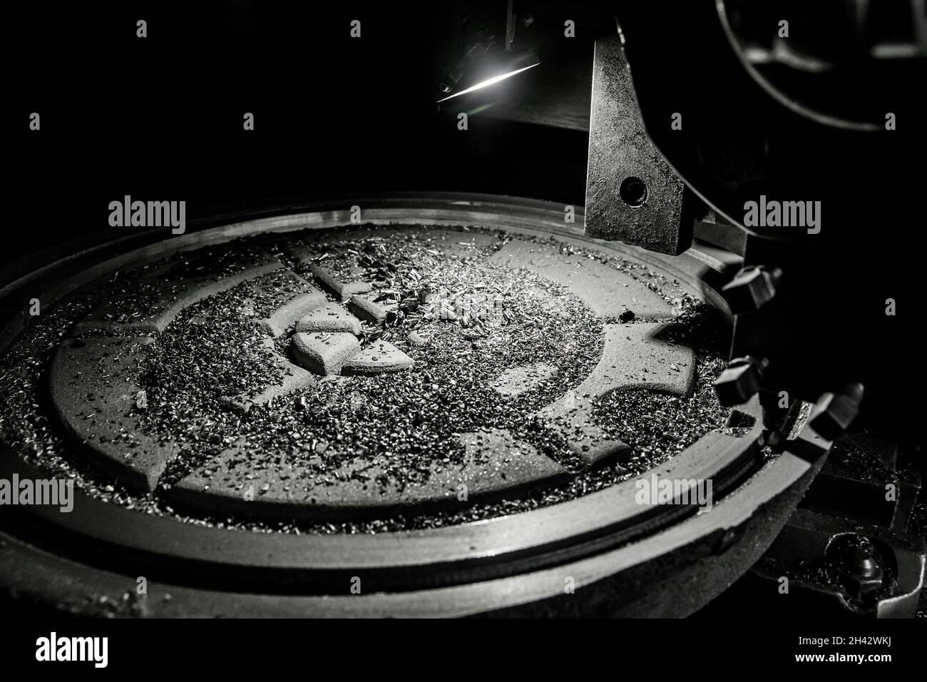 Chips after processing the cast iron hatch on the carousel machine in ...