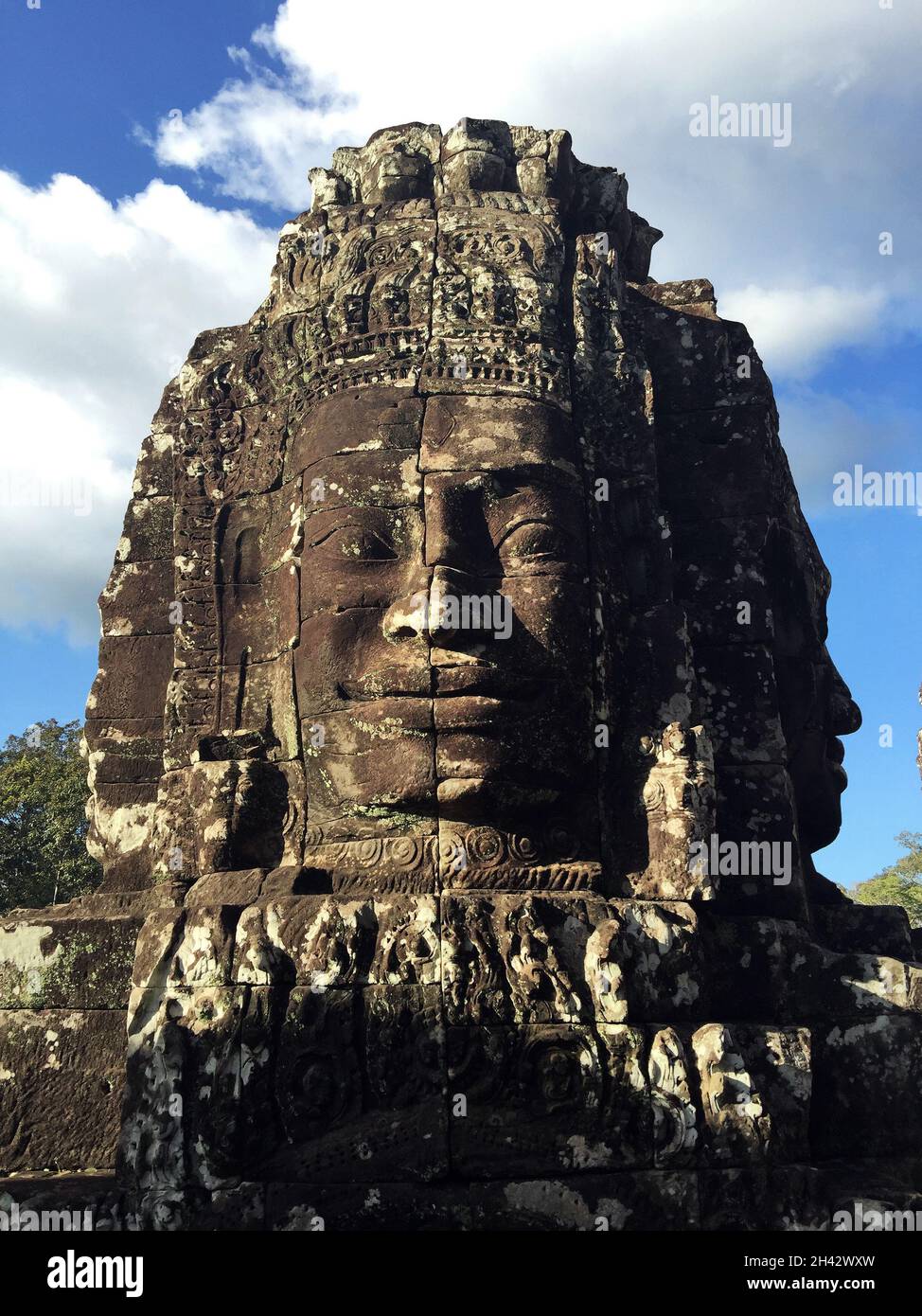 A smiling face made of stone in the shape of the face of the Bayon ...