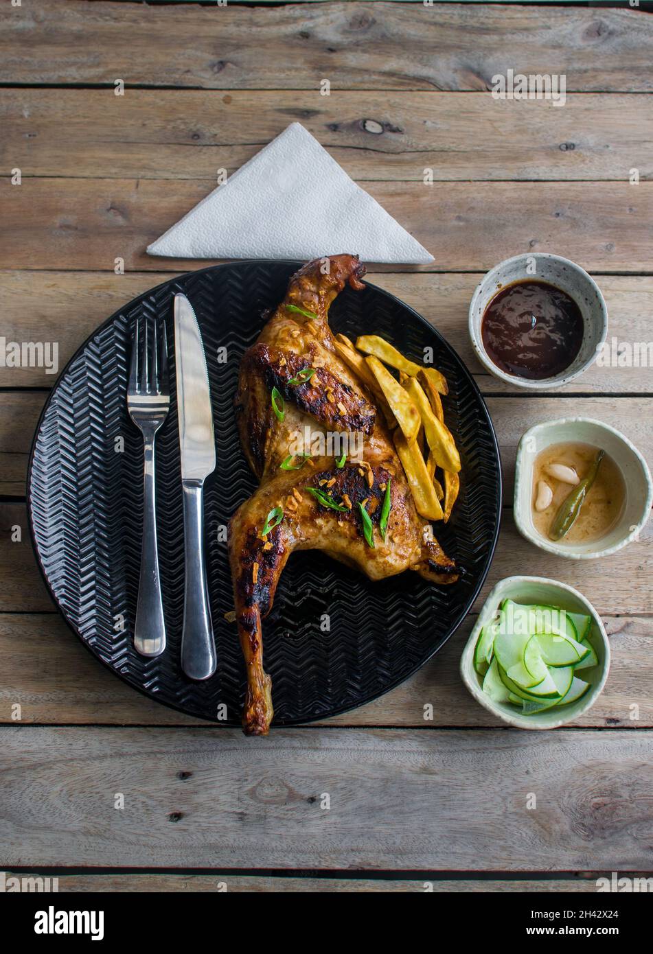 A vertical top view of chicken with sauces Stock Photo - Alamy