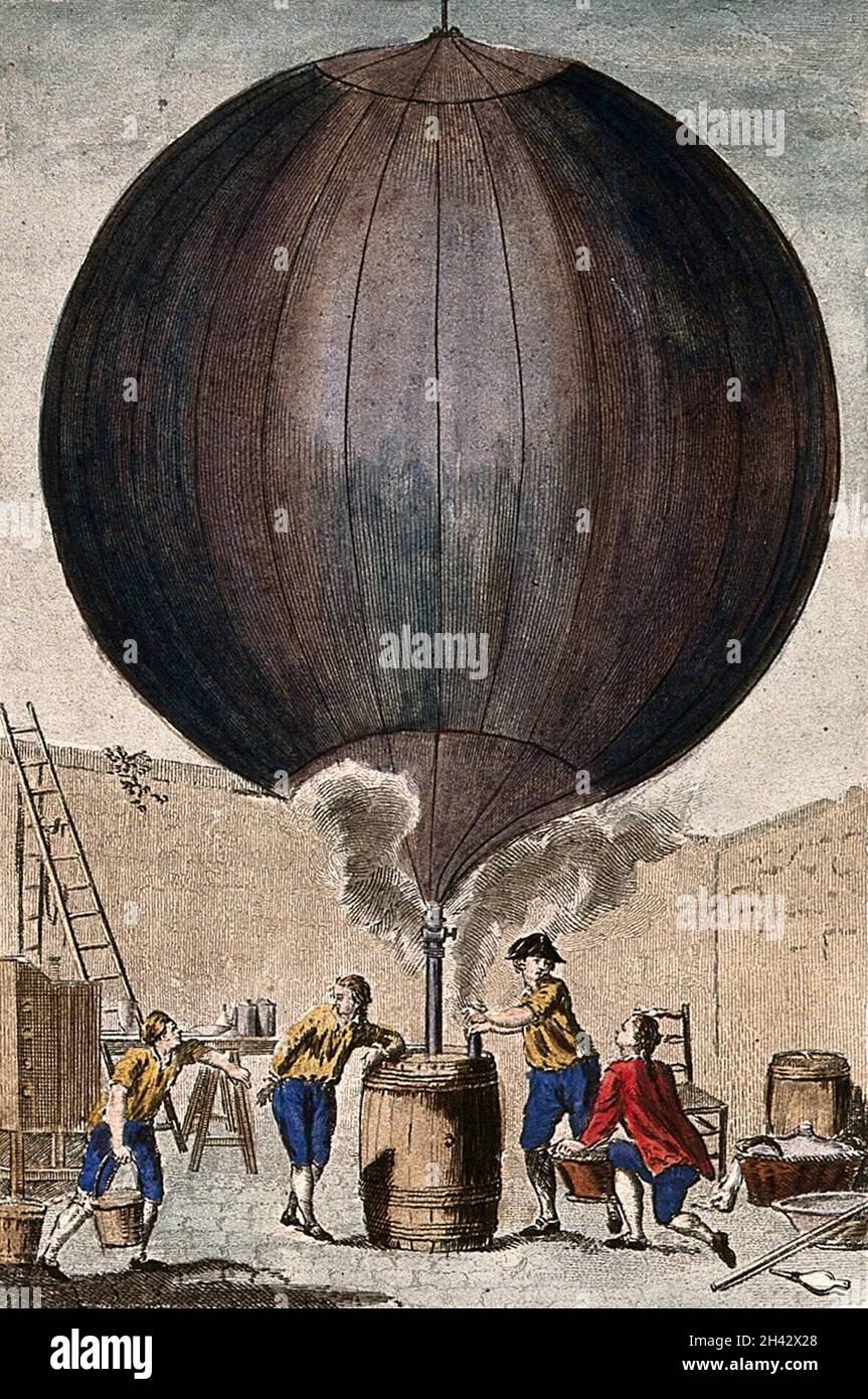 As smoke rises towards the balloon men are rushing towards it with ...