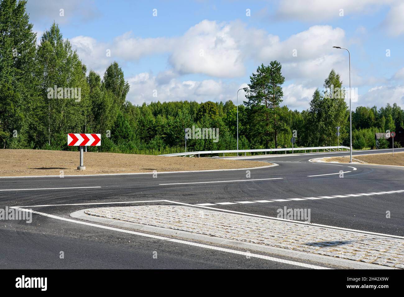 reconstructed road section with a new roundabout, reflective direction ...