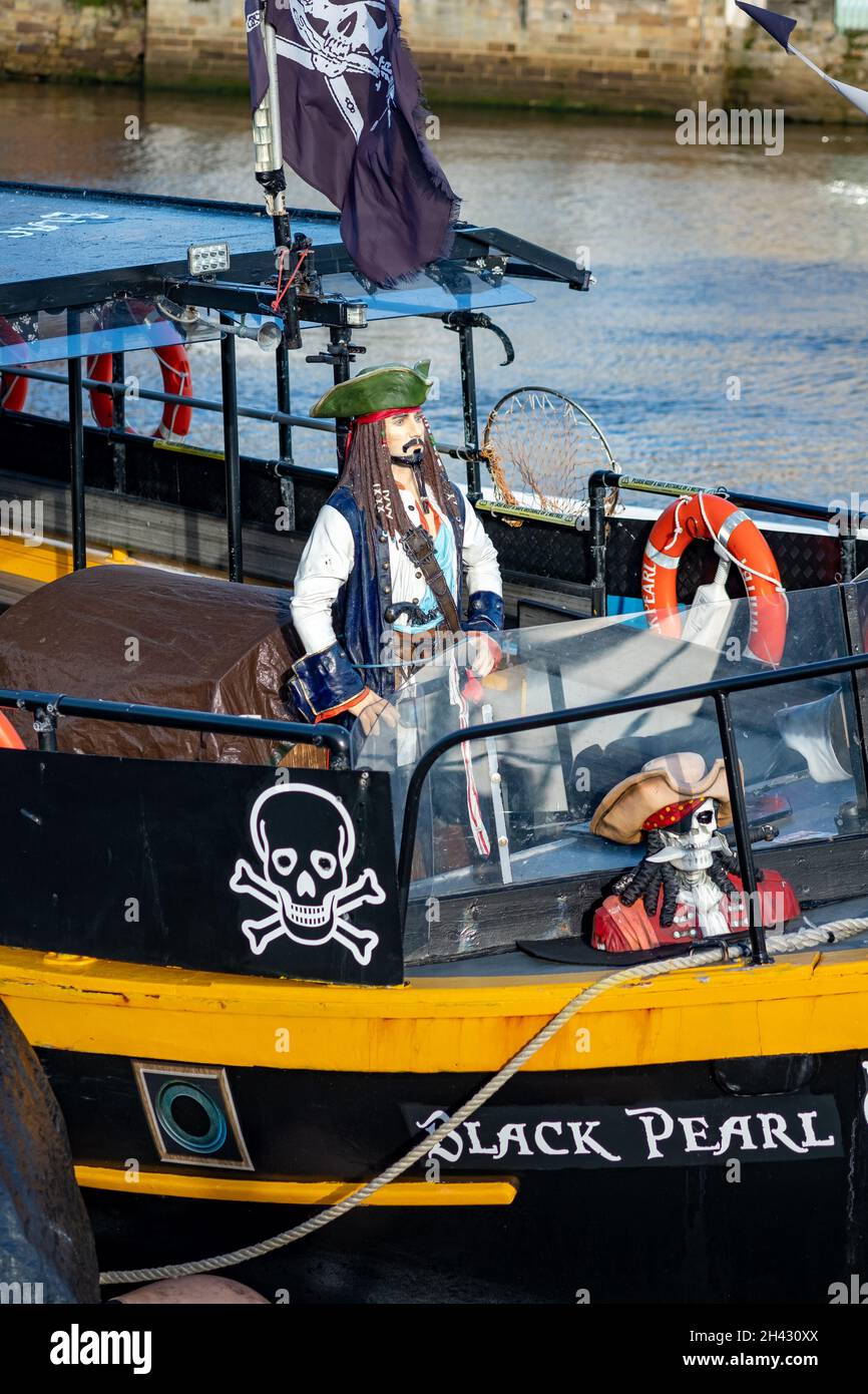 The pirate and skeleton statues on the front end of the Black Pearl ...