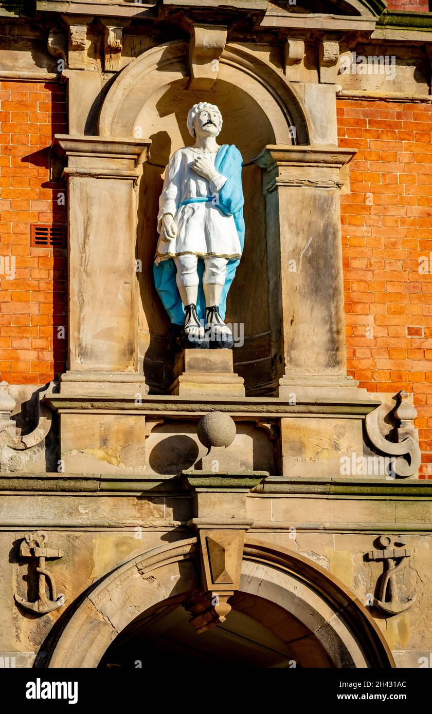The Grand Turk statue placed on a building along the waterside in ...