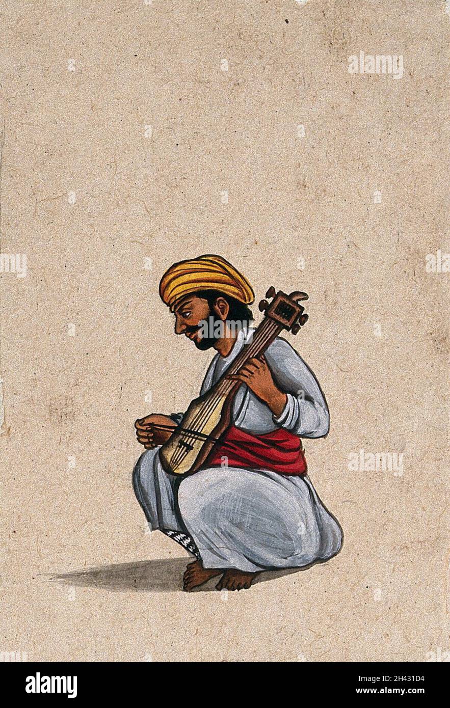 A musician playing the Indian violin. Gouache painting by an Indian ...