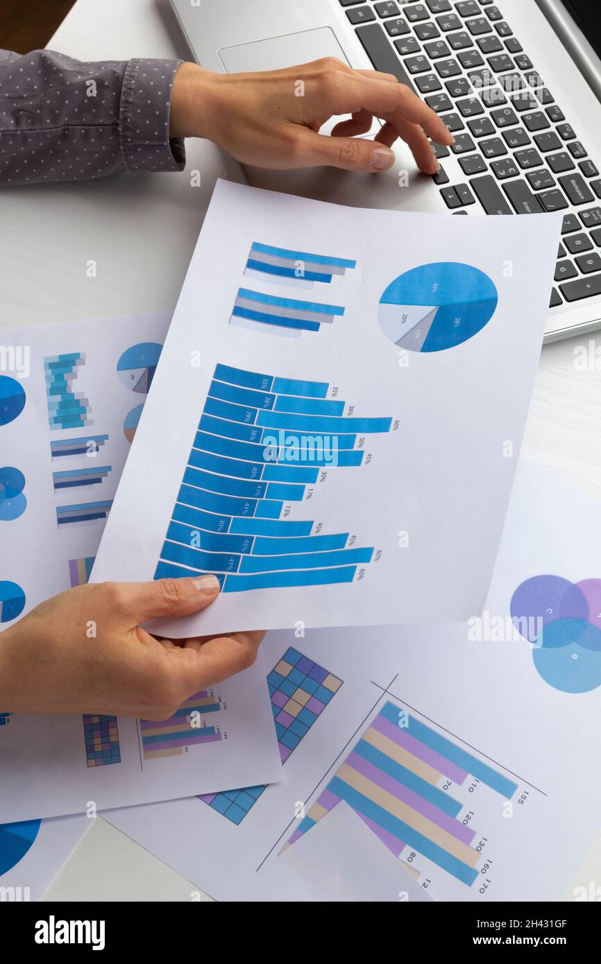 Statistical reports, analysis on paper. Many business financial growth ...