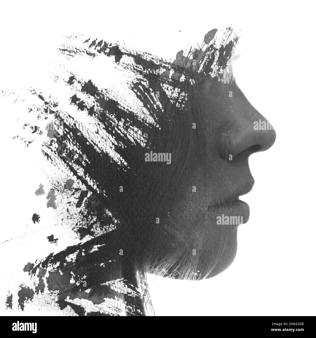 A black and white profile portrait of a woman combined with paint ...