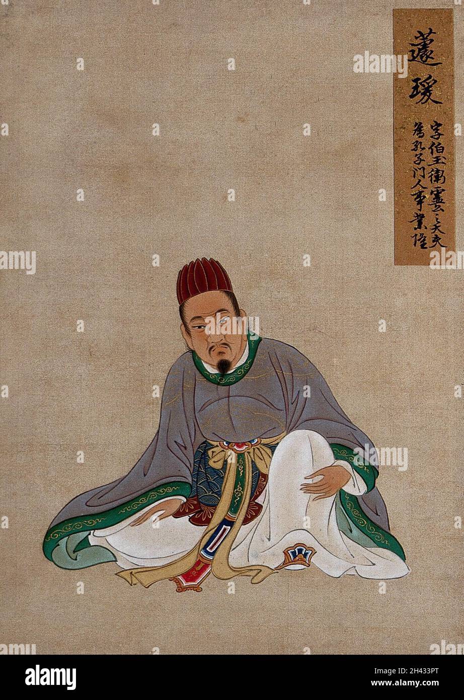 A Chinese figure, seated, wearing pale mauve robes with green border ...