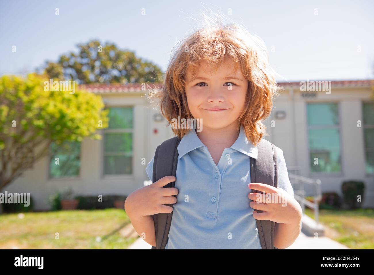 Elementary school kid at school. Pupil funny face Stock Photo - Alamy