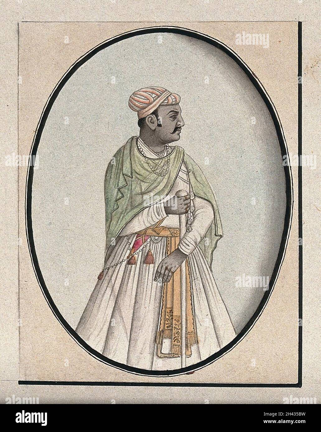 A Mughal courtier with a green scarf draped around his shoulders ...