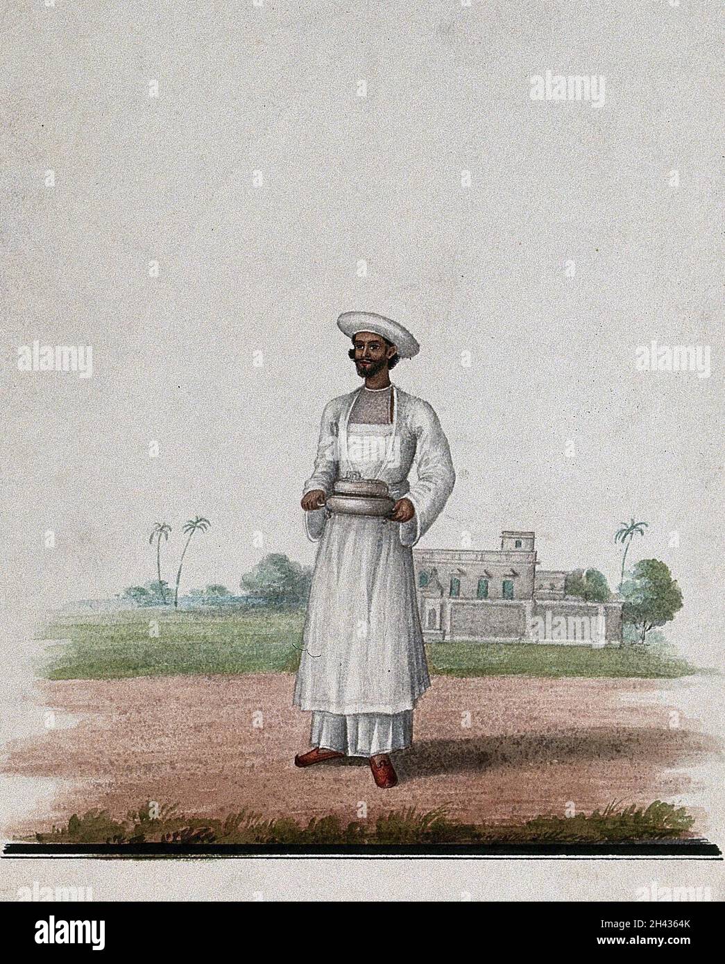 A servant carrying a serving dish. Watercolour by an Indian artist ...